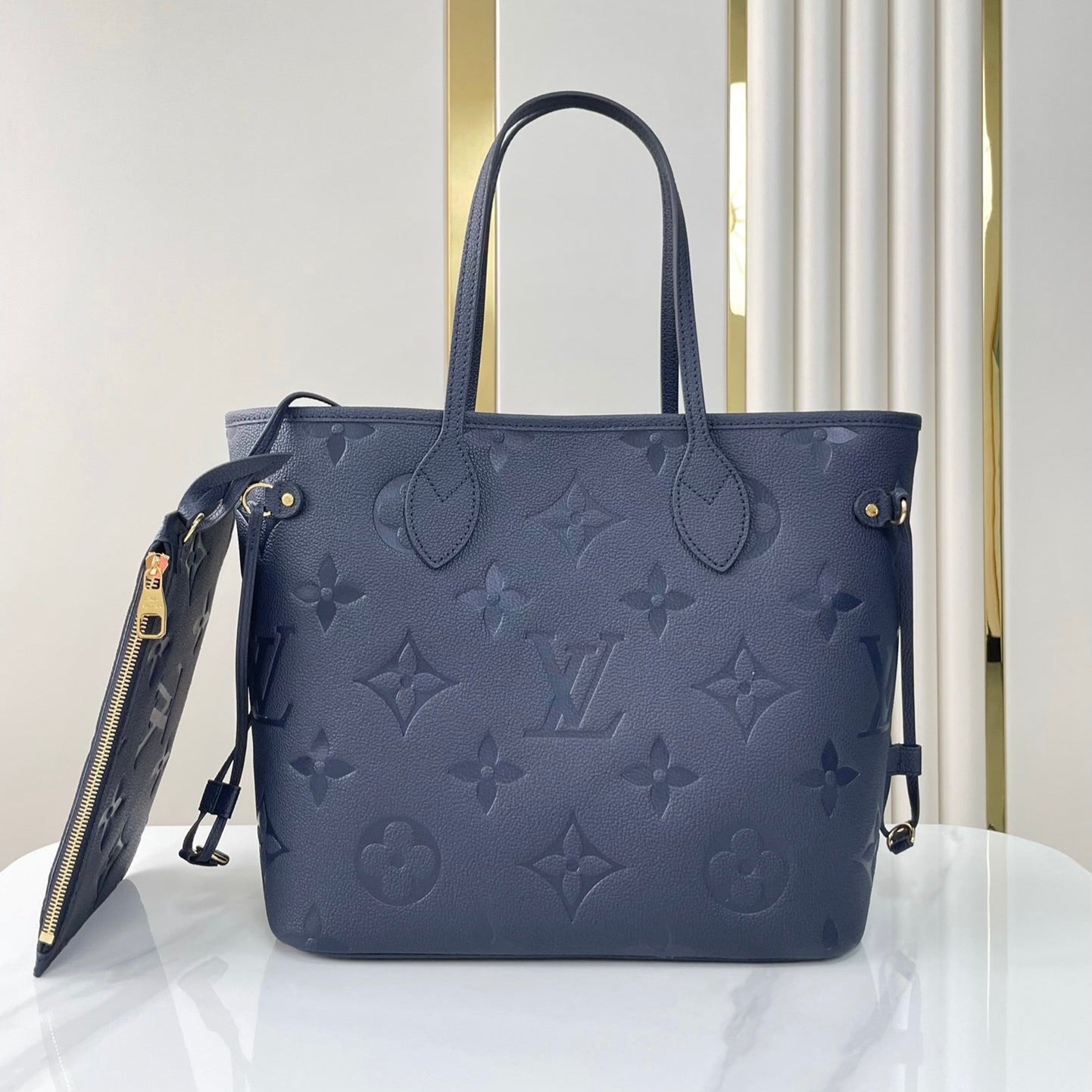 NEVERFULL MM 31 IN DARK NAVY MONOGRAM EMPREINTE LEATHER – Kal Recovery