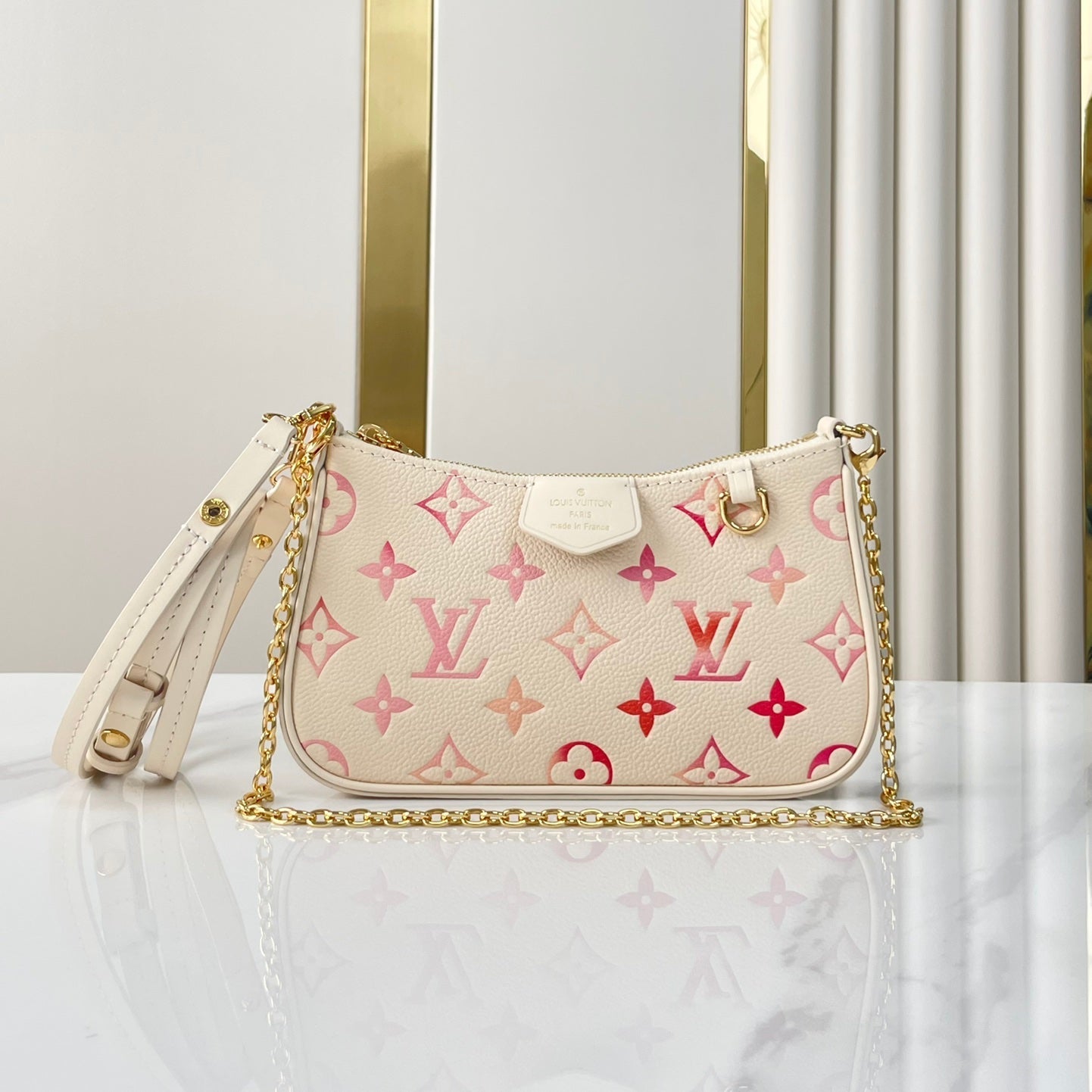 EASY POUCH ON STRAP 19 IN SUNRISE AQUARELLE MONOGRAM EMPREINTE LEATHER ...