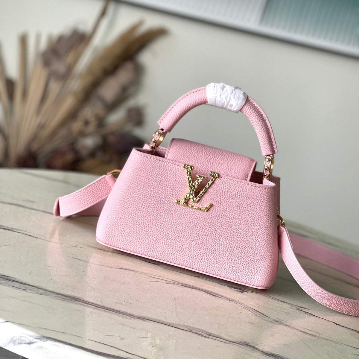 CAPUCINES EAST-WEST MINI 22 IN BLUSH PINK CALFSKIN GOLD HARDWARE – Meejuri
